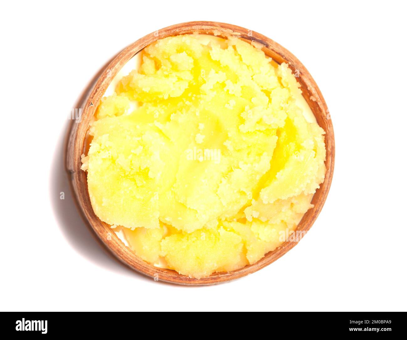 Ghee in wooden bowl isolated on white background top view Stock Photo ...