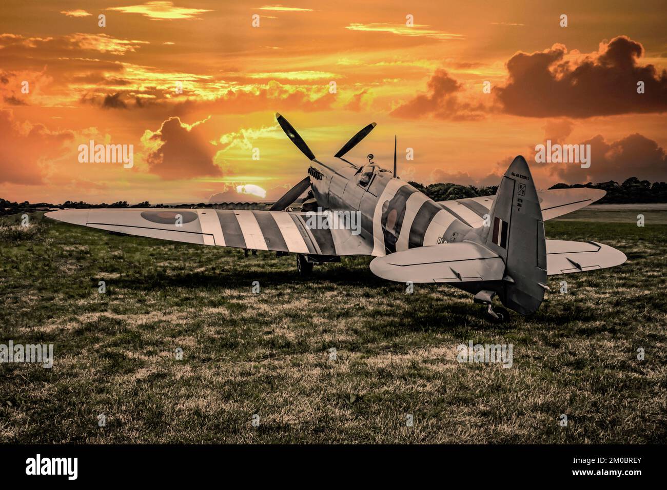 World War Two Spitfire. Photo recon Mark 11 in D-Day Markings Stock ...