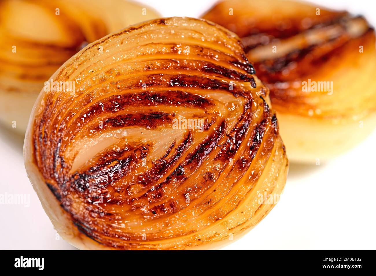 Roasted onions in a closeup Stock Photo - Alamy