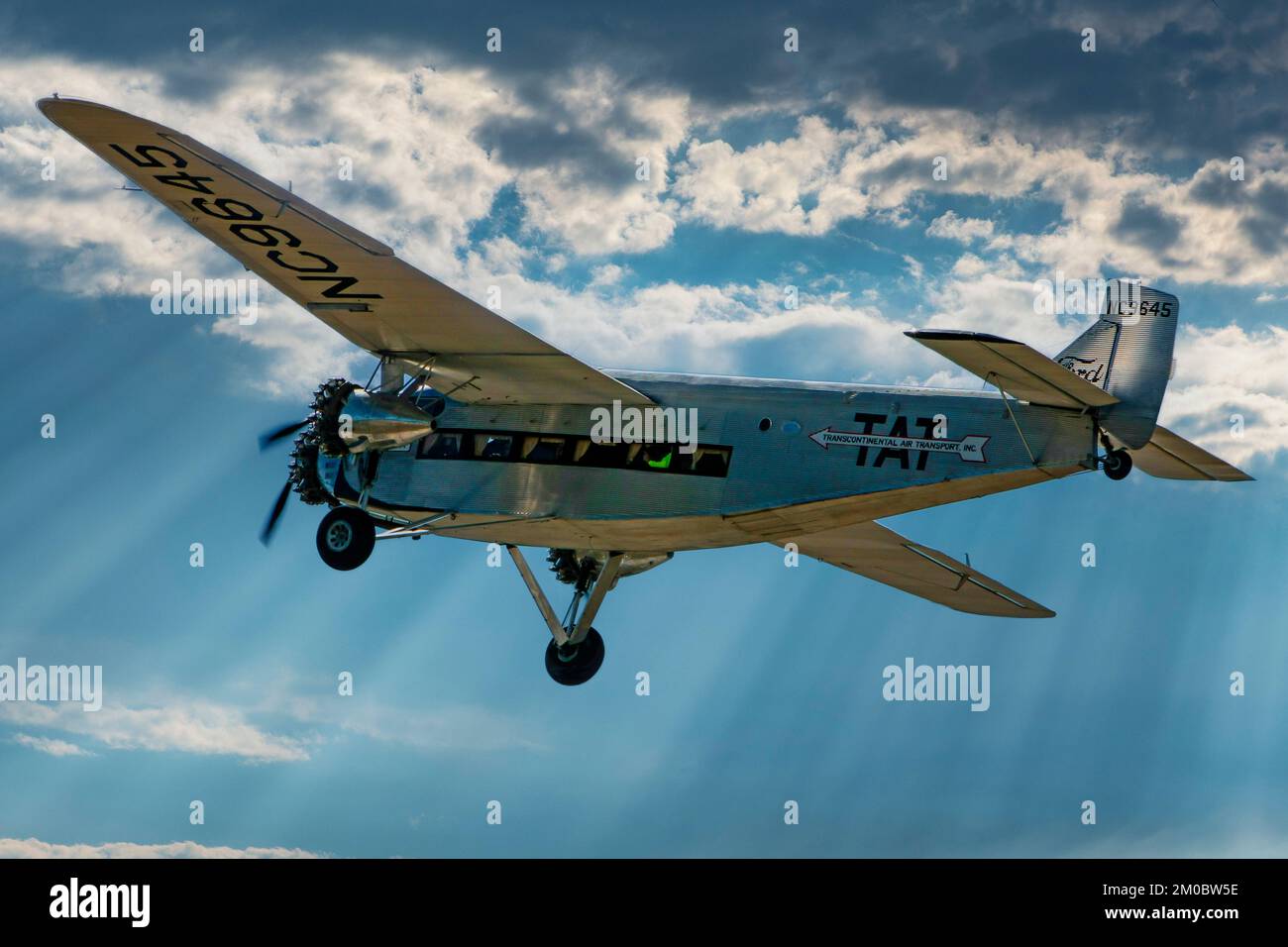 A 1929 Ford $-AT-E Trimotor plane in the skies over Sarasota Florida ...