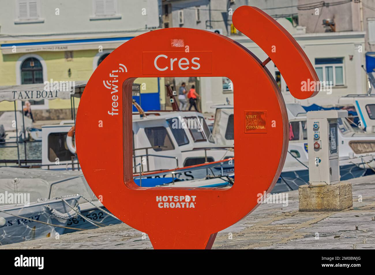 Cres red annular frame old town port Croatia Stock Photo - Alamy
