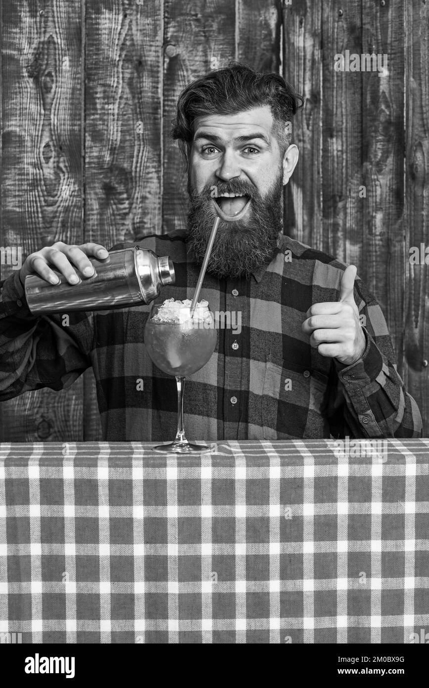 Barman advice concept. Barman with beard and cheerful face Stock Photo ...