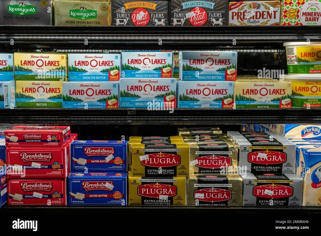 A display of various domestic and imported brands of butter in a ...