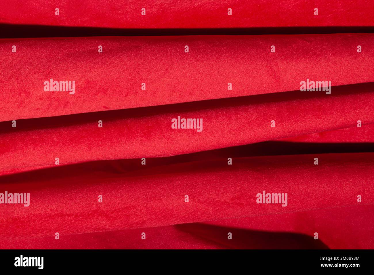 Luxurious cloth background of velvet, velor fabric in trendy color viva ...