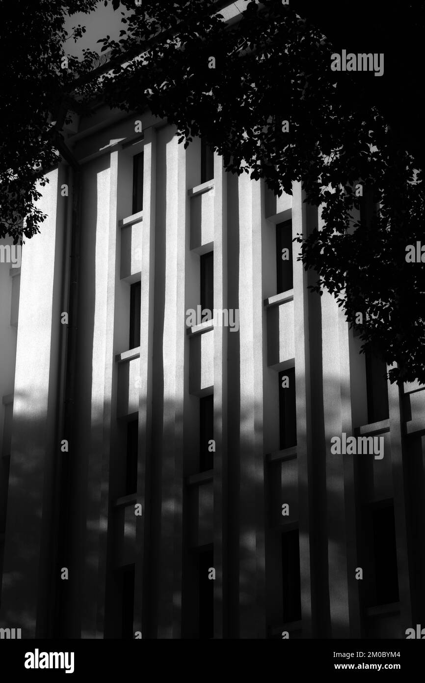 A grayscale of a city building Stock Photo - Alamy