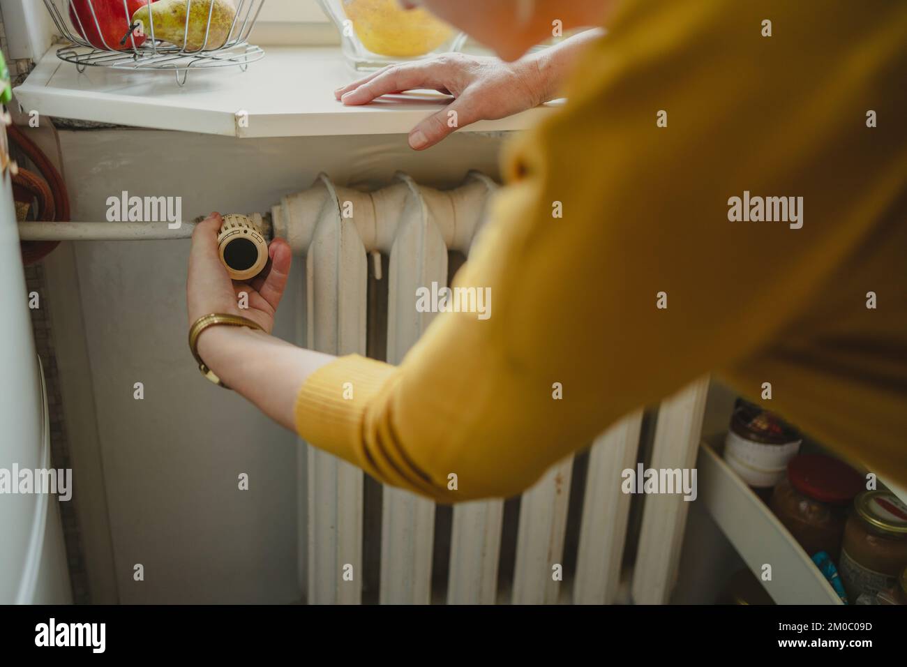 Heat radiator knob woman hi-res stock photography and images - Alamy