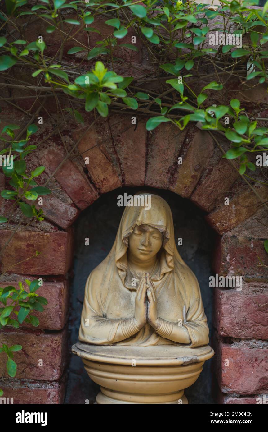 Head of marble statue of roman Ceres or greek Demeter in the park of ...
