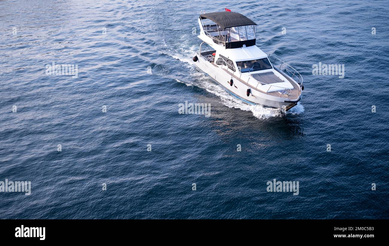 Yacht at sea in Europe. Aerial view of luxury floating ship at sunset ...