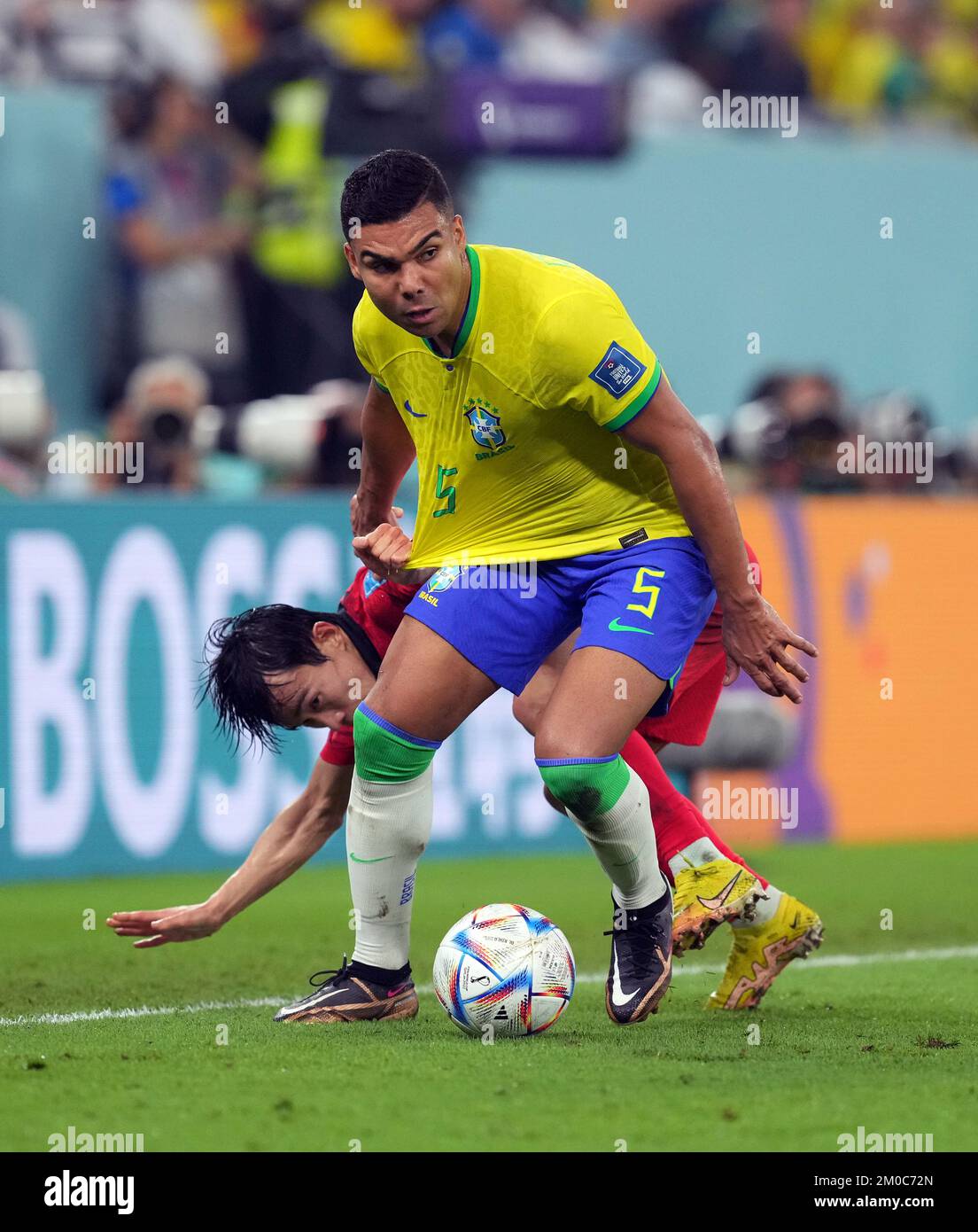South Korea's Kim Moon-hwan pulls back on Brazil's Casemiro during the ...