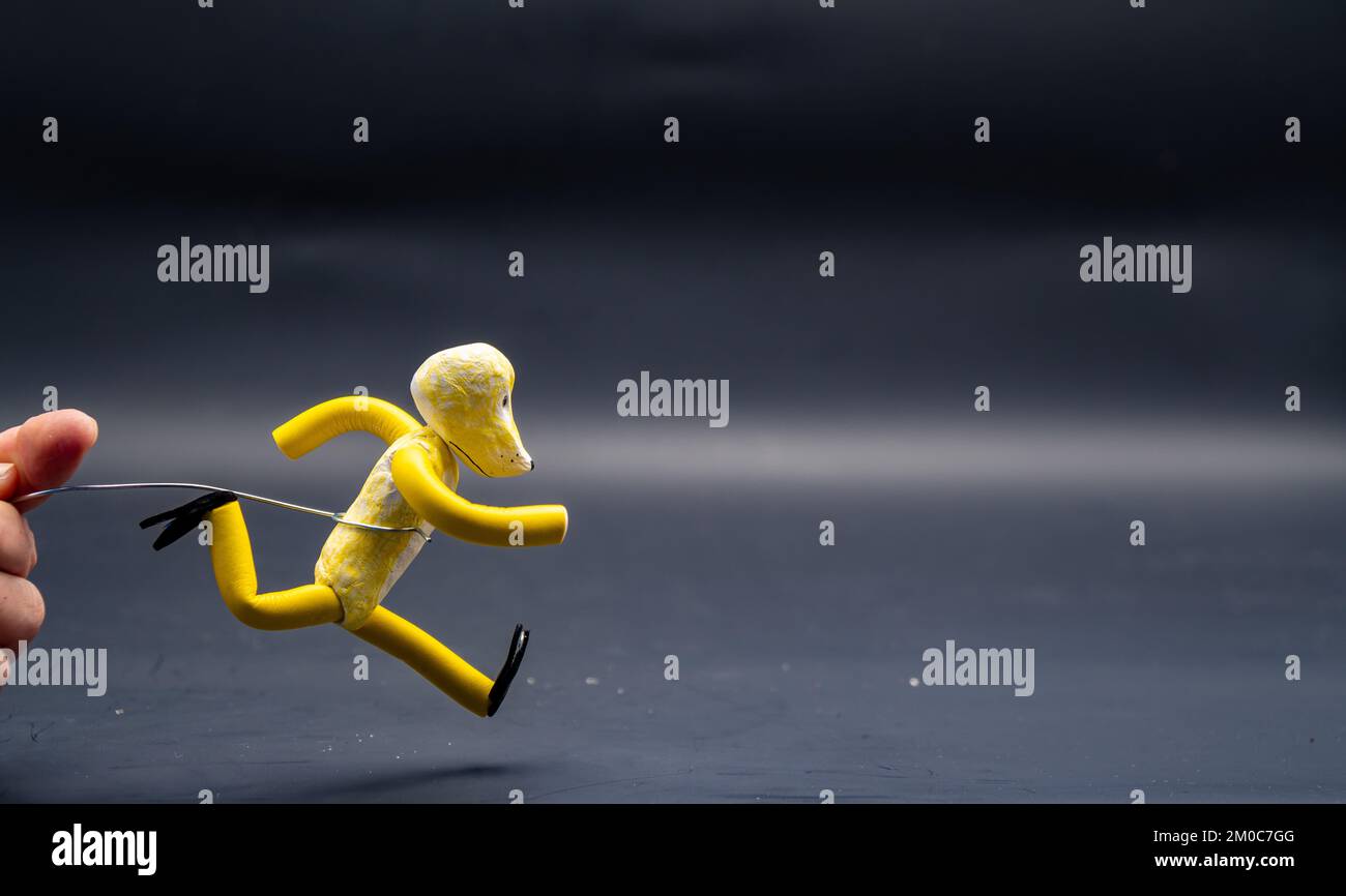 Process of running stopmotion. Long running stride. Man's hand holding ...