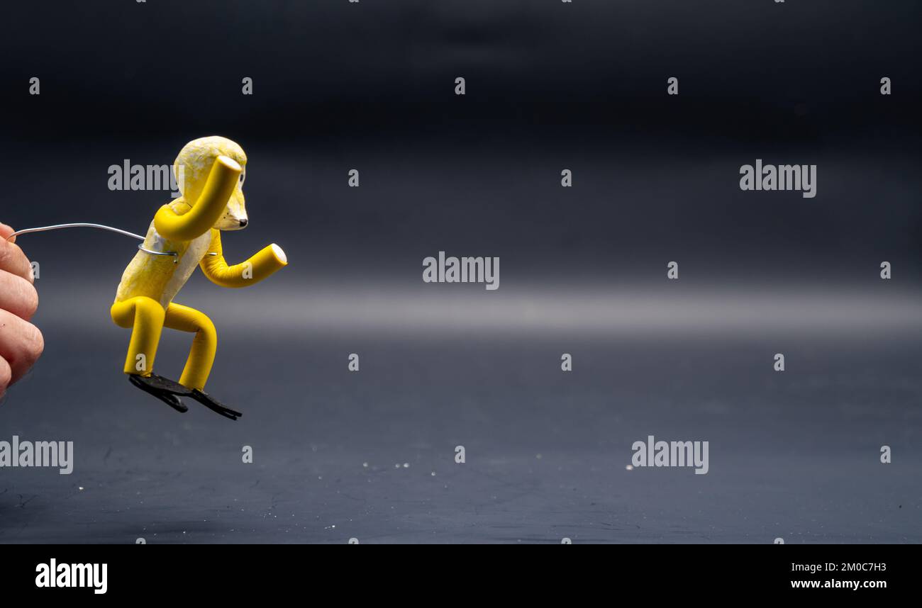 Stop motion animation hand yellow hi-res stock photography and images ...