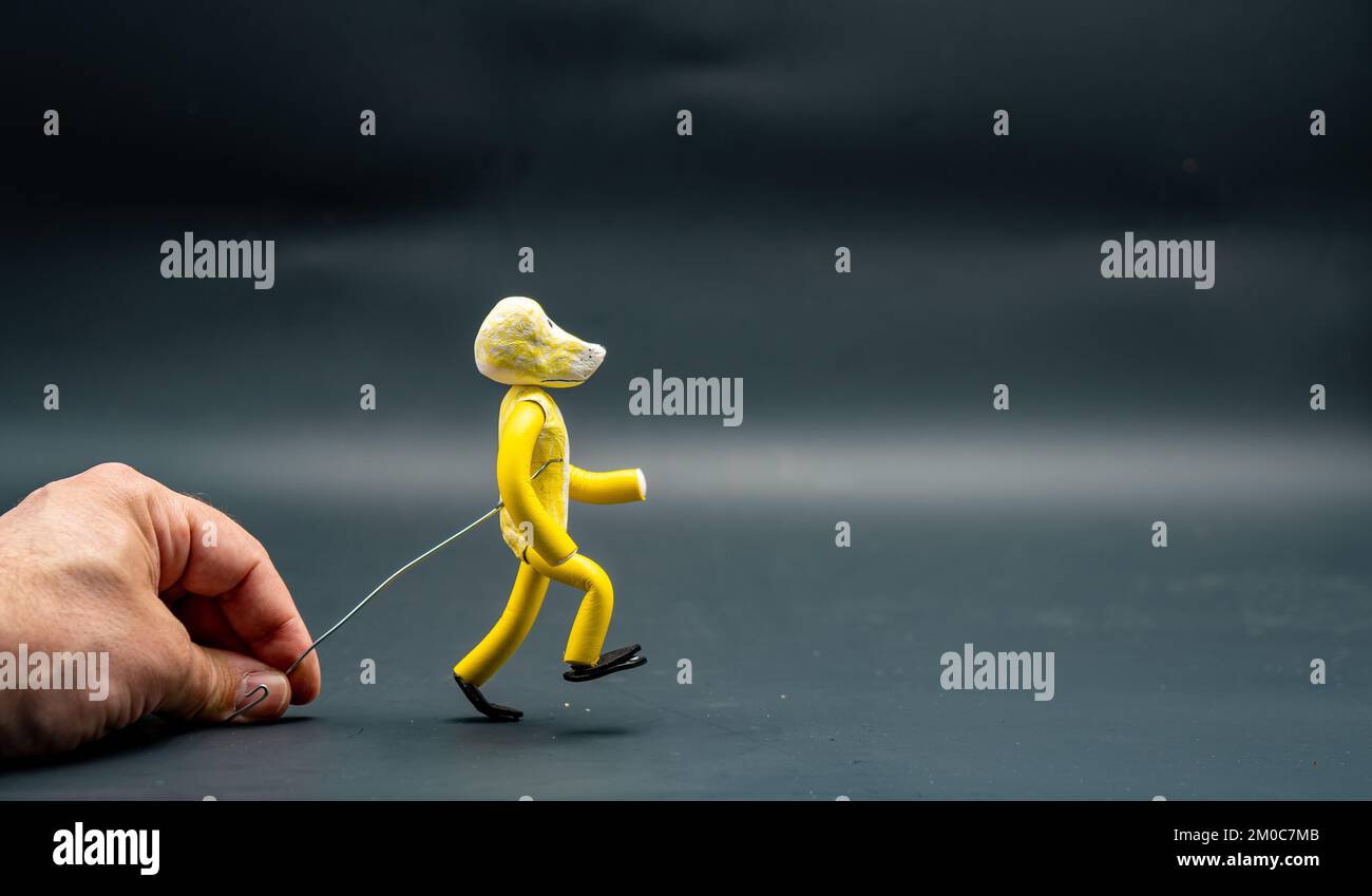 Stopmotion process of walking. Fifth step. Man's hand holding with an ...