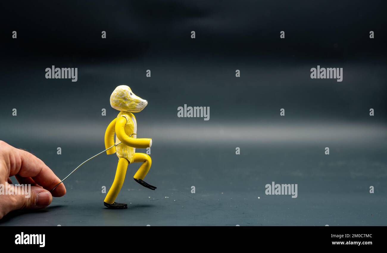 Stopmotion process of walking. Fourth step. Man's hand holding with an ...