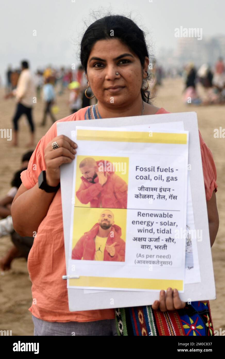 Mumbai, Maharashtra, India. 4th Dec, 2022. An activist hold a placard ...
