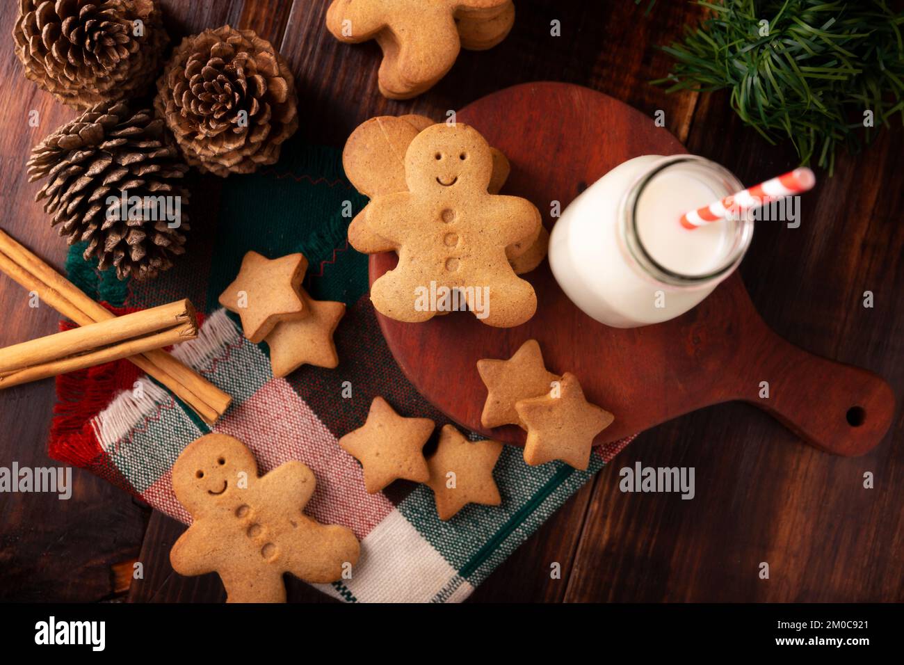 Homemade gingerbread man cookies and milk, traditionally made at ...