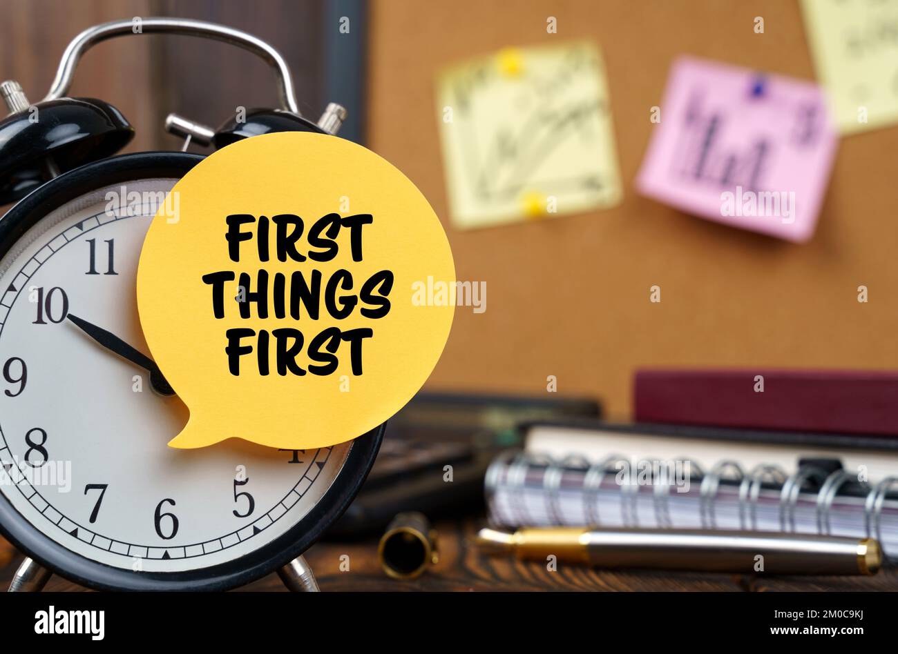 Business concept. The alarm clocks have a sticker with the inscription ...