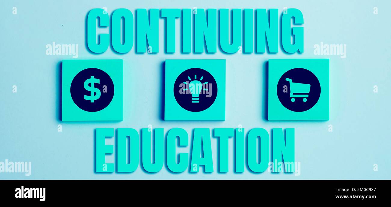 Hand writing sign Continuing Education. Business overview Continued ...