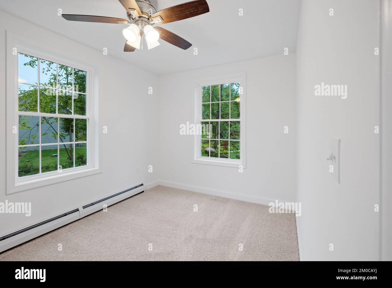 A white modern room without furniture and with big windows Stock Photo ...