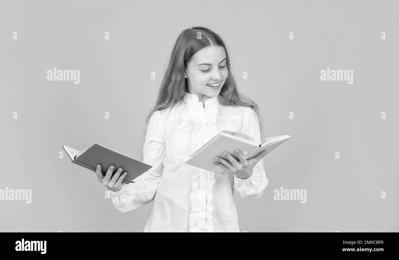 smart child in white shirt ready to study do homework with book on ...