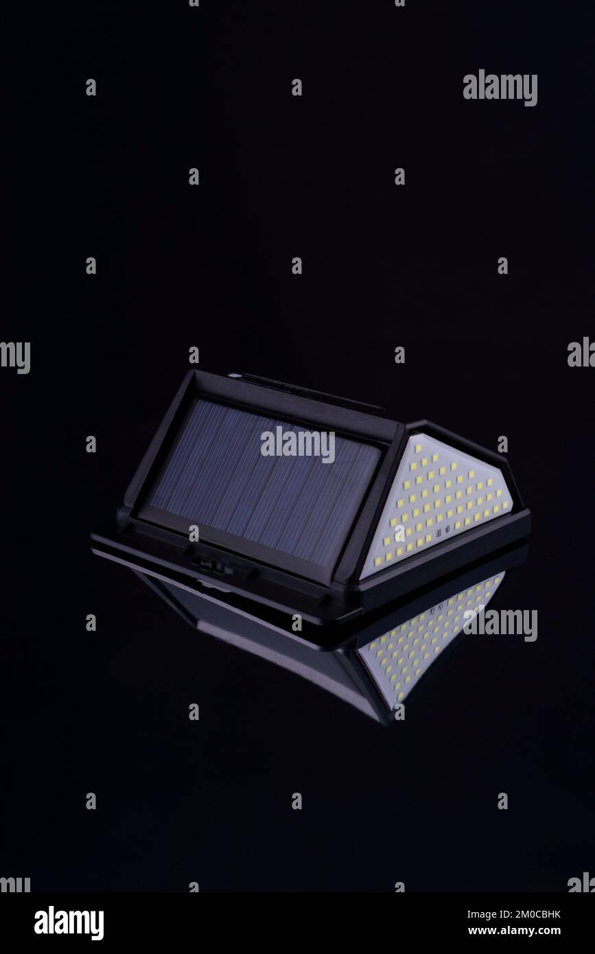 solar lamp panel on black background solar powered lantern Stock Photo ...