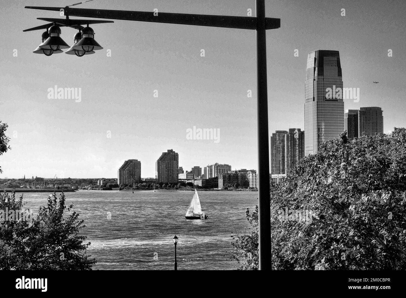 Battery Park City. A large green area with a promenade along the Hudson ...