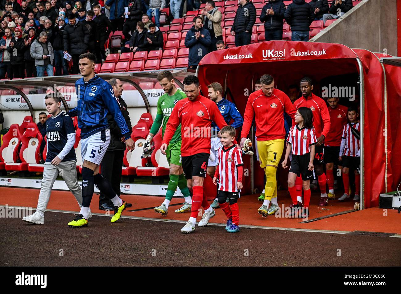 Sunderland AFC captain Corry Evans and Jake Cooper of Millwall lead ...