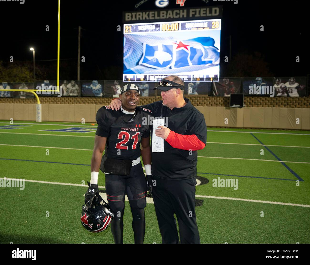 Georgetown Texas USA, December 3 2022: Coach comforts disappointed ...
