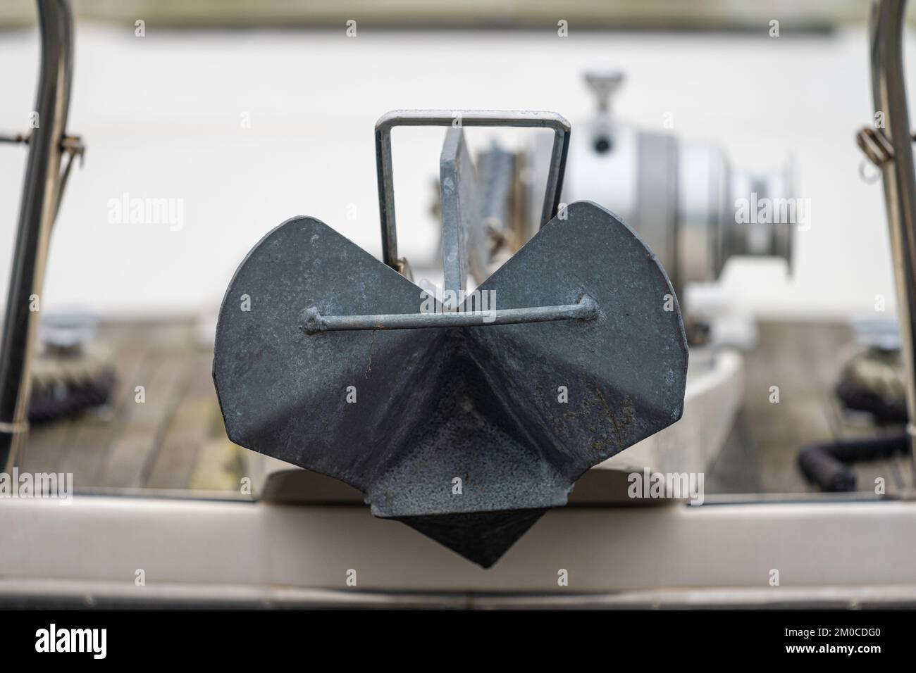 Anchor mounted on the bow of a boat Stock Photo - Alamy