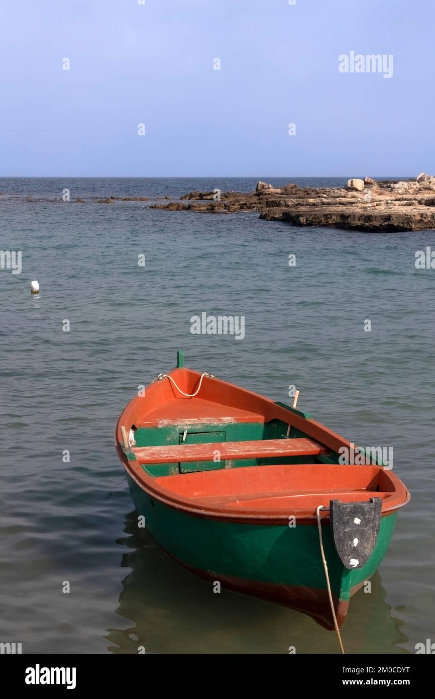 PUGLIA, ITALY - OCTOBER 18, 2022: Traditional wooden fishing boat with ...