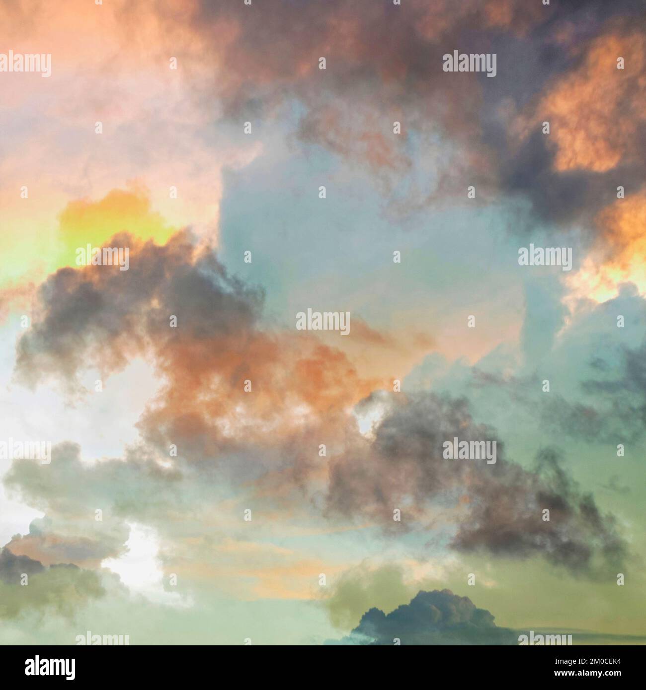 Semi abstract impressionistic colour photograph of cloudscapes backlit ...