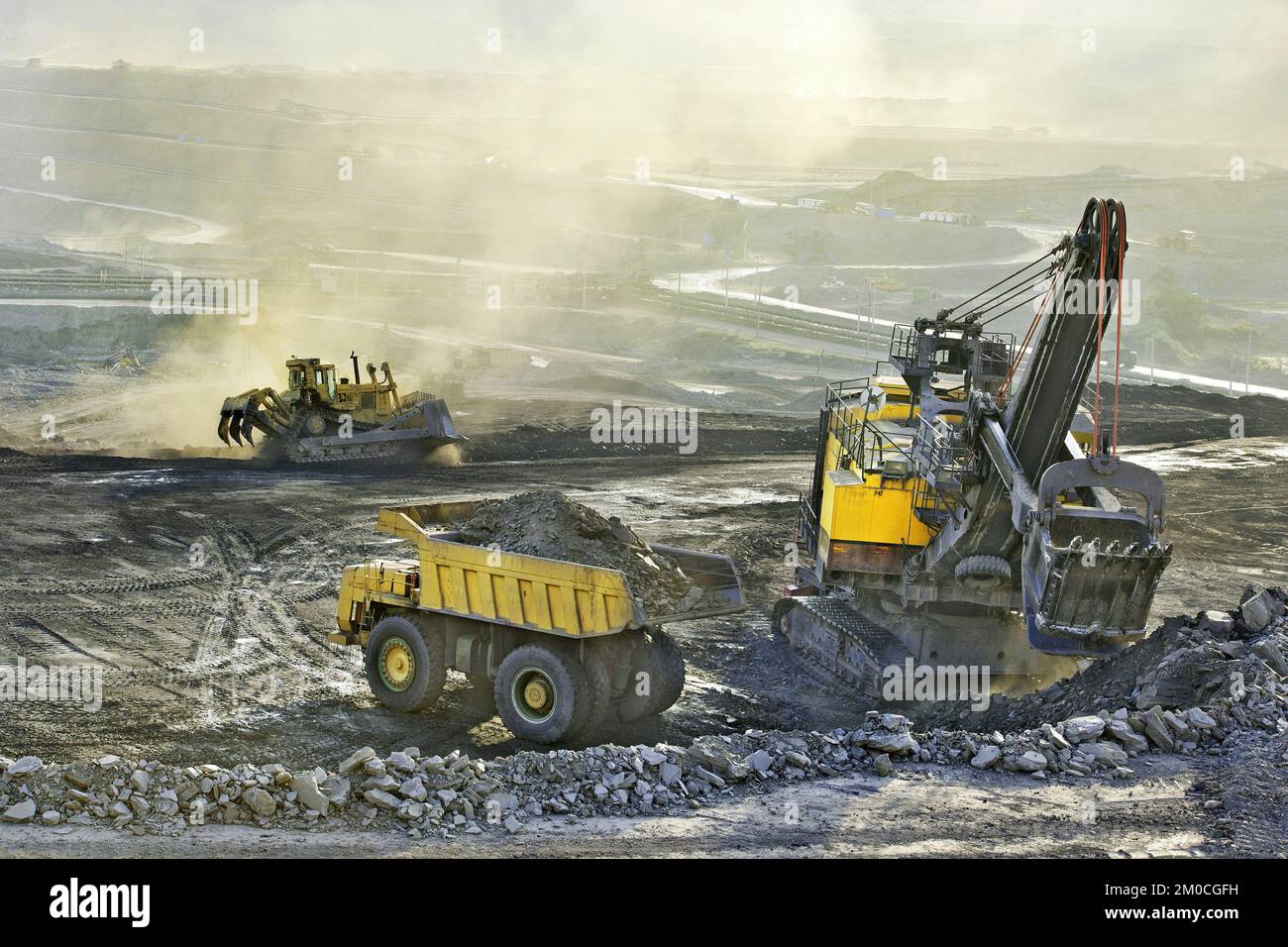 Vehicles at a surface mining operation Stock Photo - Alamy
