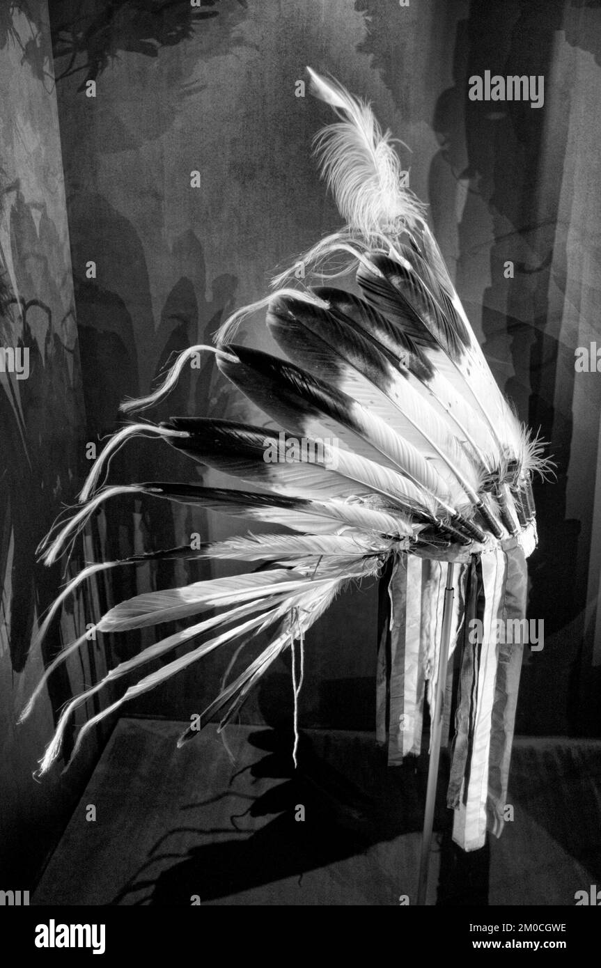 A carving of a head, Plumes inside the National Museum of the American ...