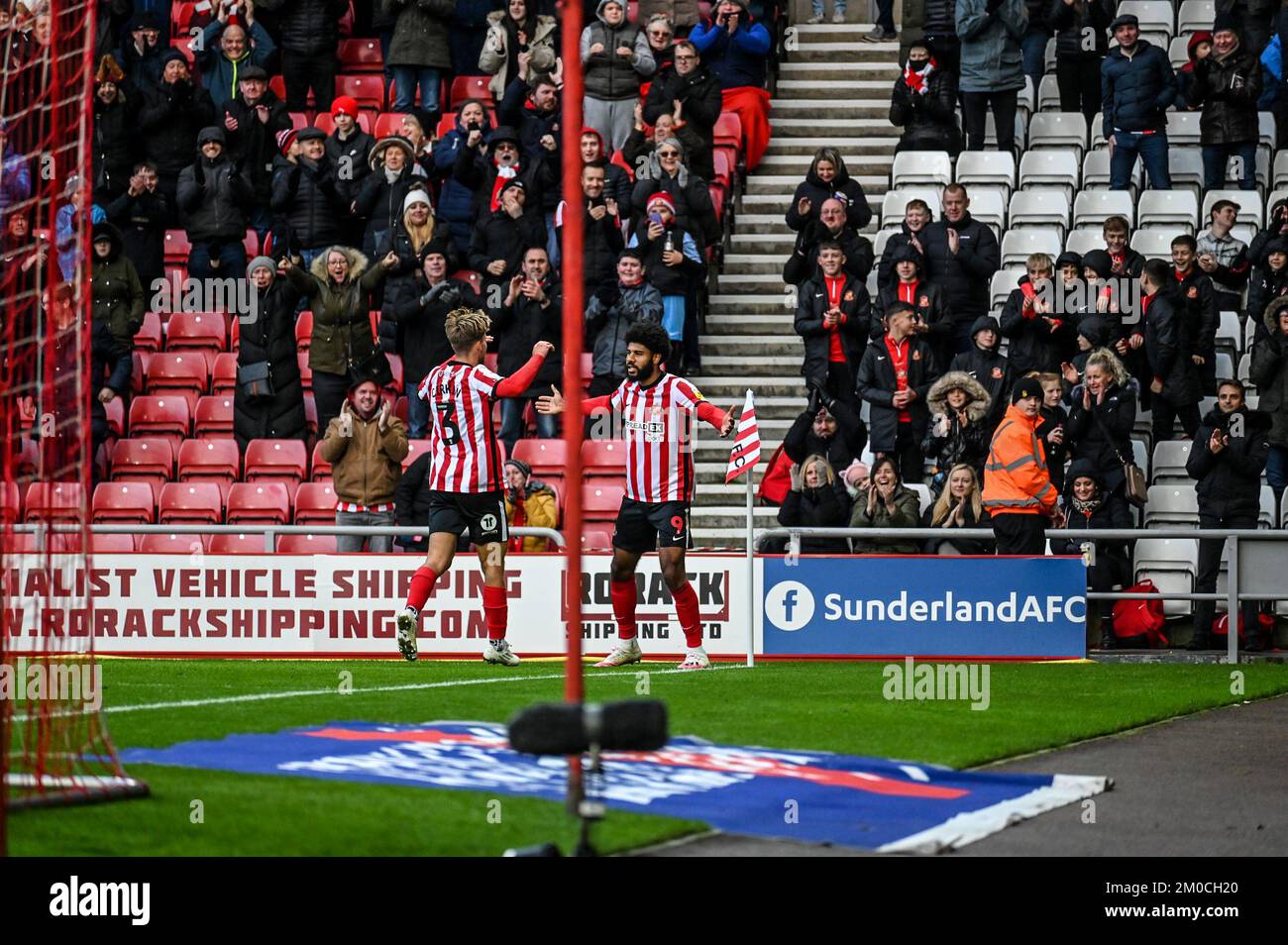 Sunderland AFC's Dennis Cirkin (left) congratulates Ellis Simms on ...