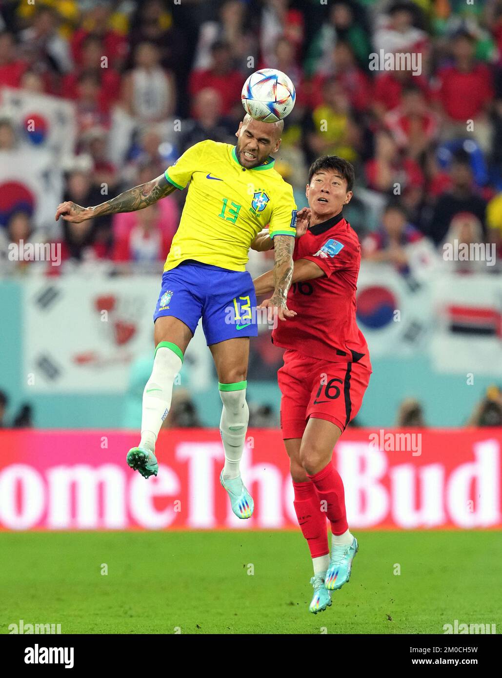 Brazil's Dani Alves (left) and South Korea's Hwang Ui-jo battle for the ...