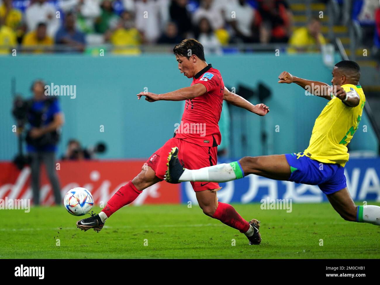 South Korea's Hwang Hee-chan (left) attempts a shot on goal during the ...