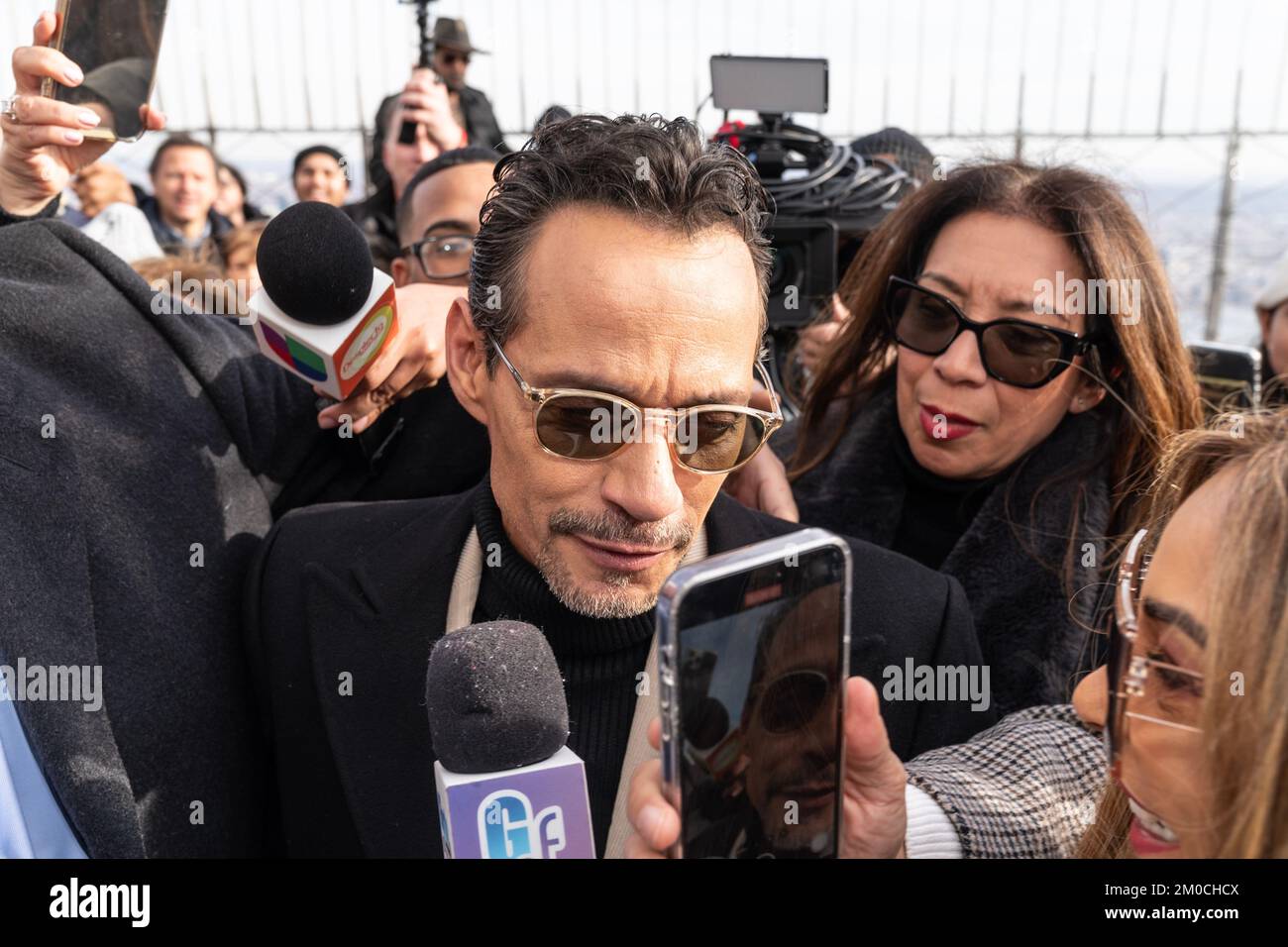 Marc Anthony speaks to press on observation deck during visit to Empire ...