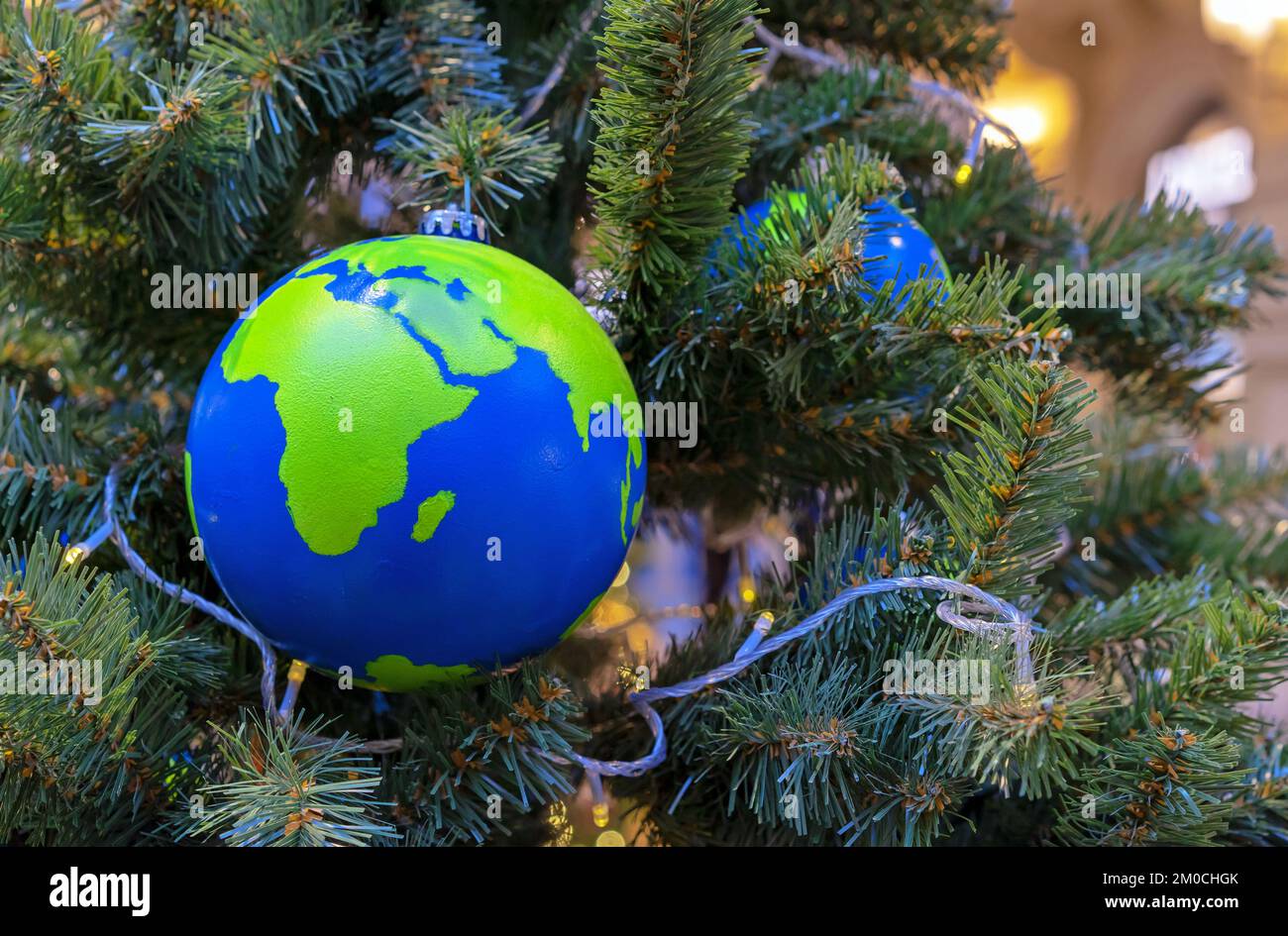 Globe-shaped Christmas ball with countries and continents on the ...