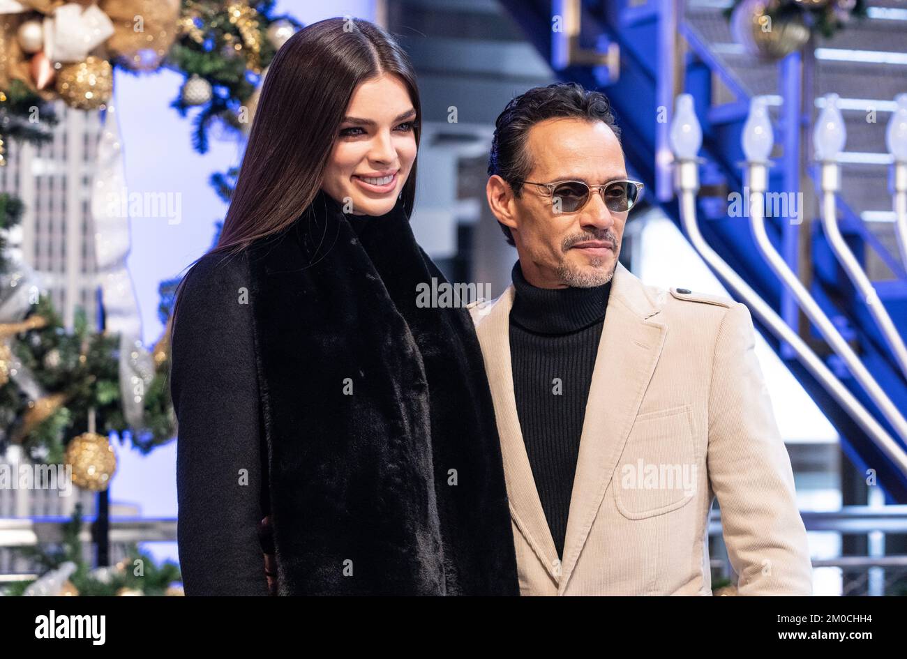 Nadia Ferreira and Marc Anthony pose on grand staircase during visit to ...