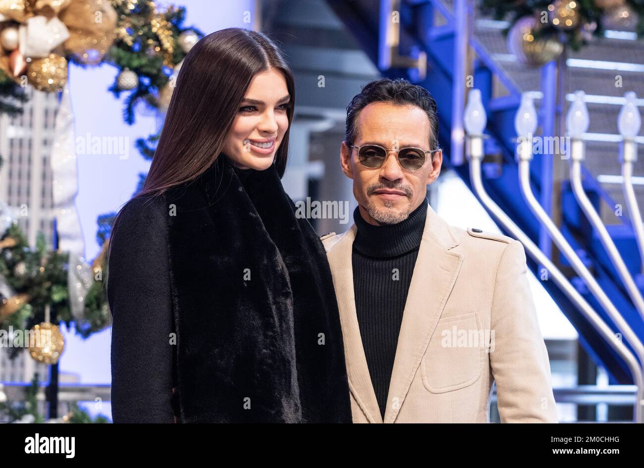 Nadia Ferreira and Marc Anthony pose on grand staircase during visit to ...