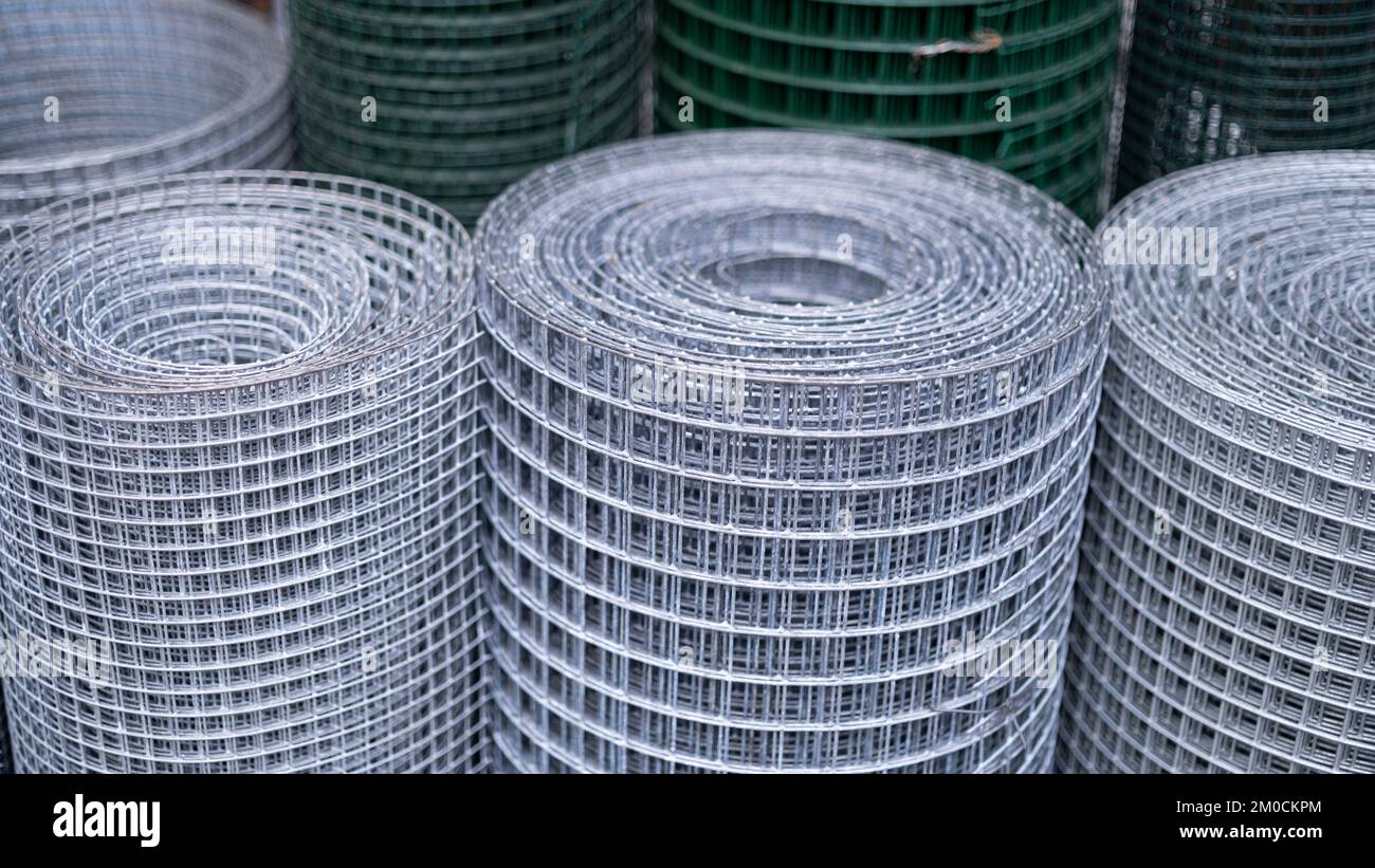 Wire in rolls, garden supplies, wire fences Stock Photo - Alamy