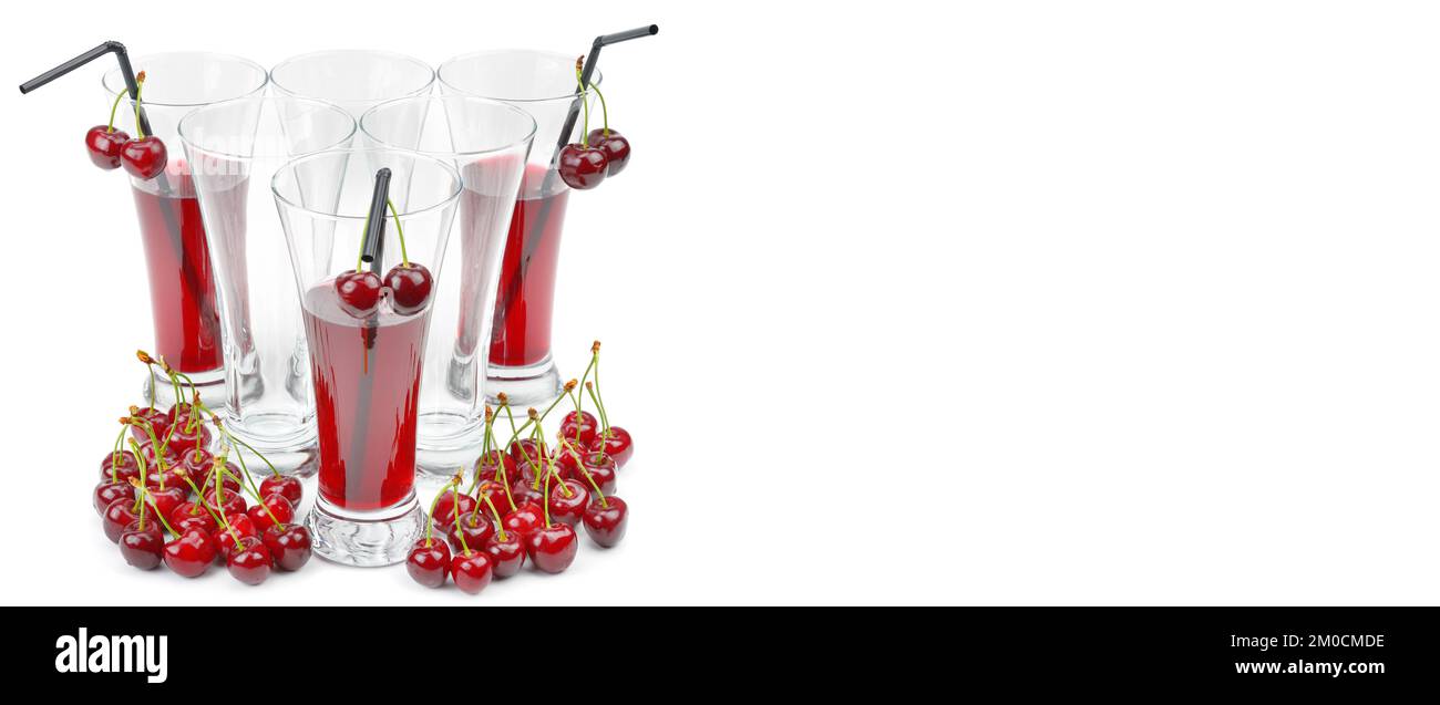 Cherry and glass of juice isolated on white background. Organic food ...