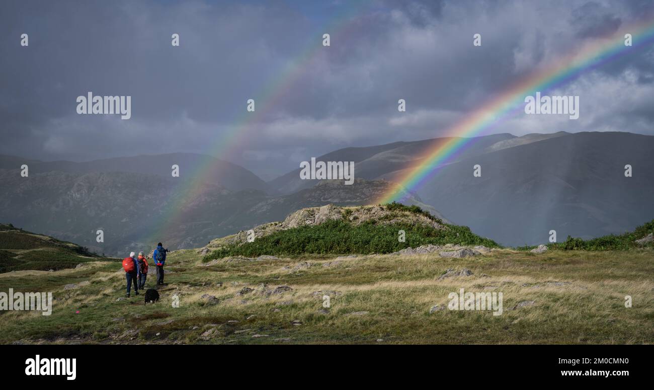 Walkers on Silver Howe in the Lake District enjoy a spectacular double ...