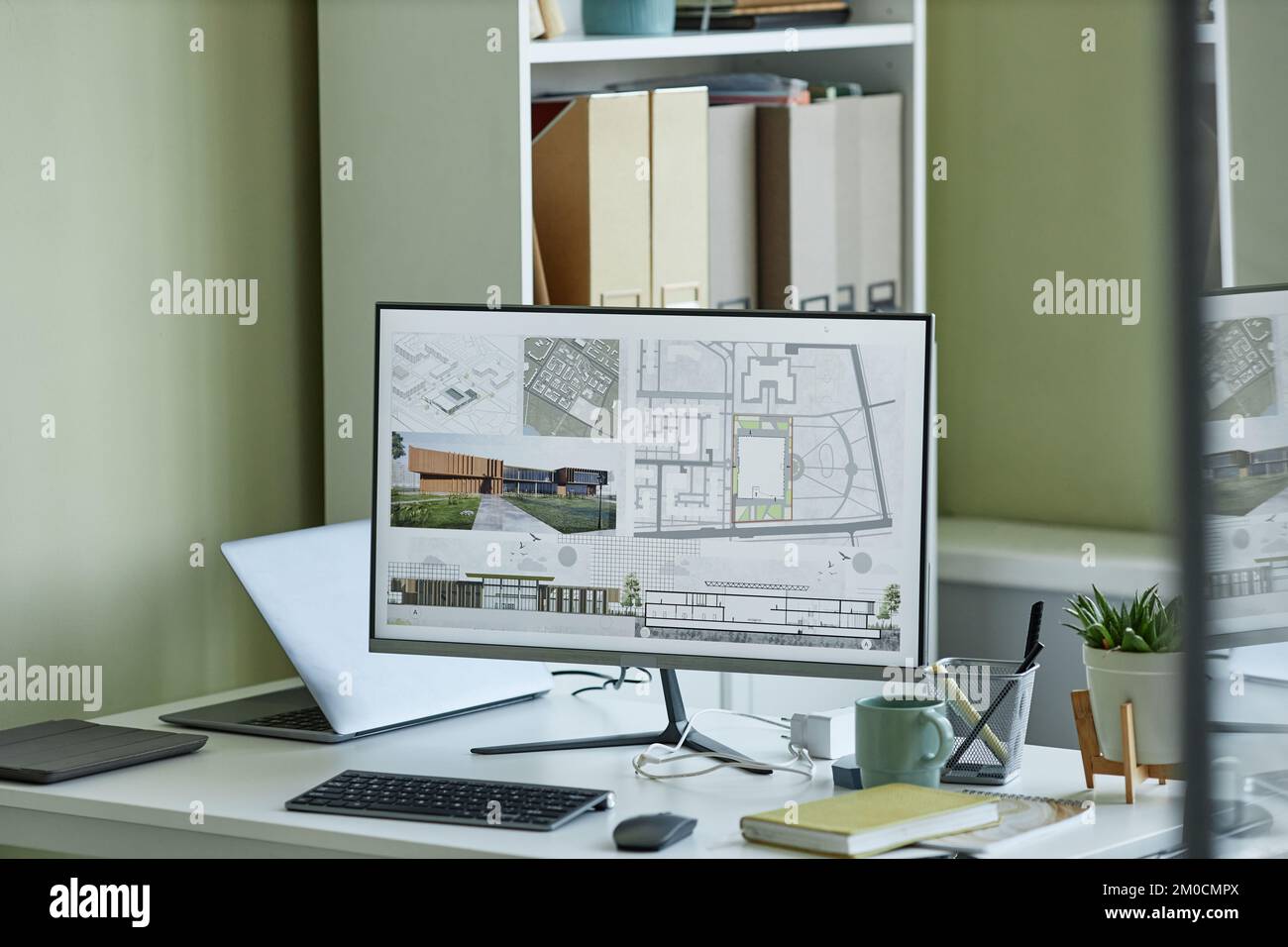 Close up of computer with 3D blueprints on screen, architects workplace ...