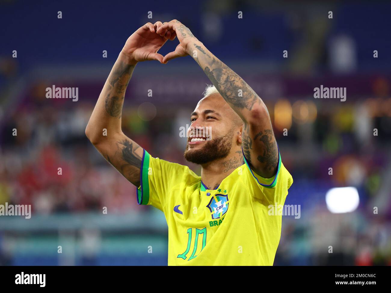 Doha, Qatar, 5th December 2022. Neymar Jr of Brazil makes a heart shape ...