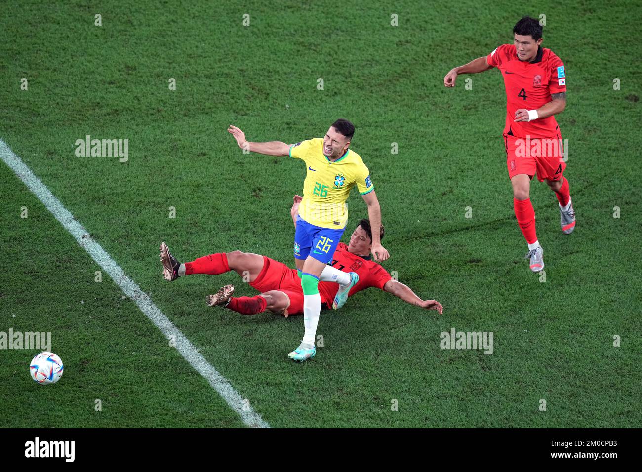Brazil's Gabriel Martinelli is tackled by South Korea's Hwang Hee-chan ...