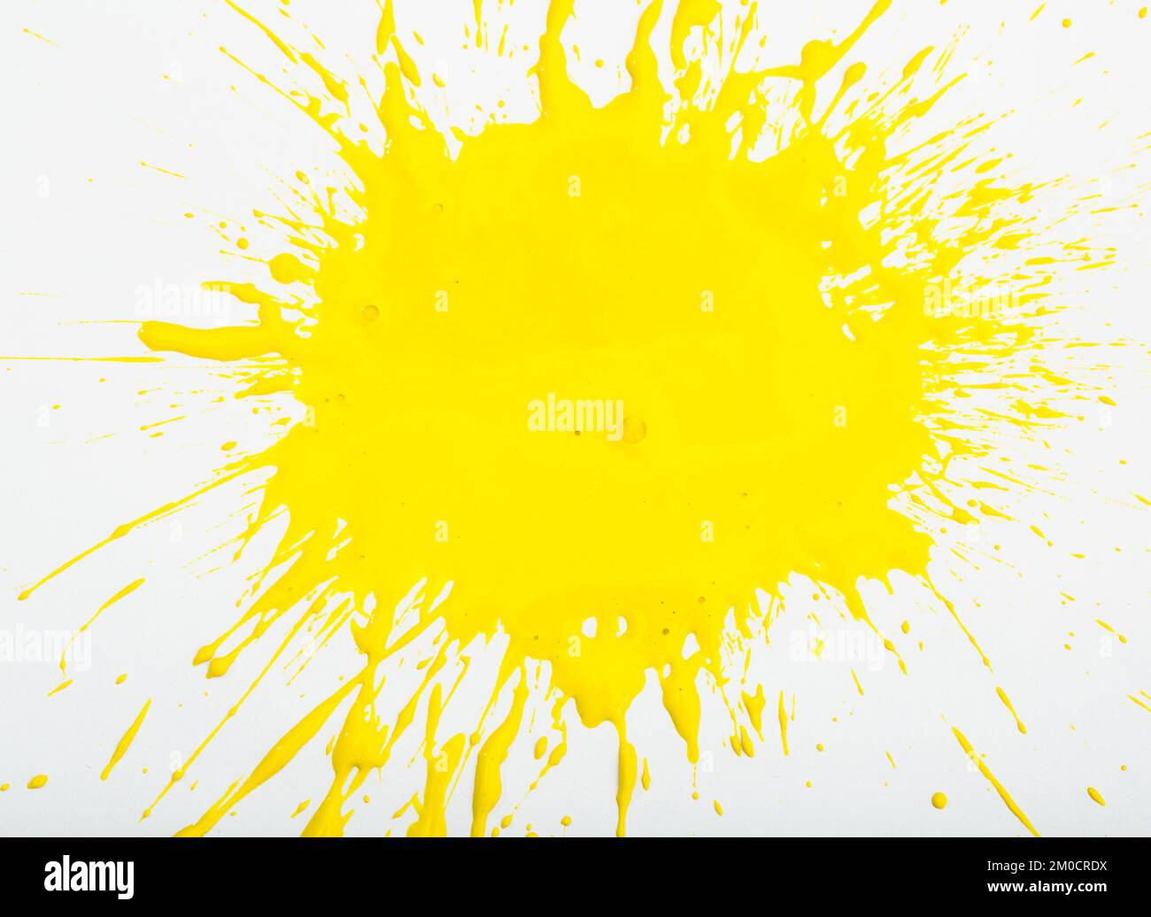 Image of yellow paint spots spilled on background of white paper Stock ...