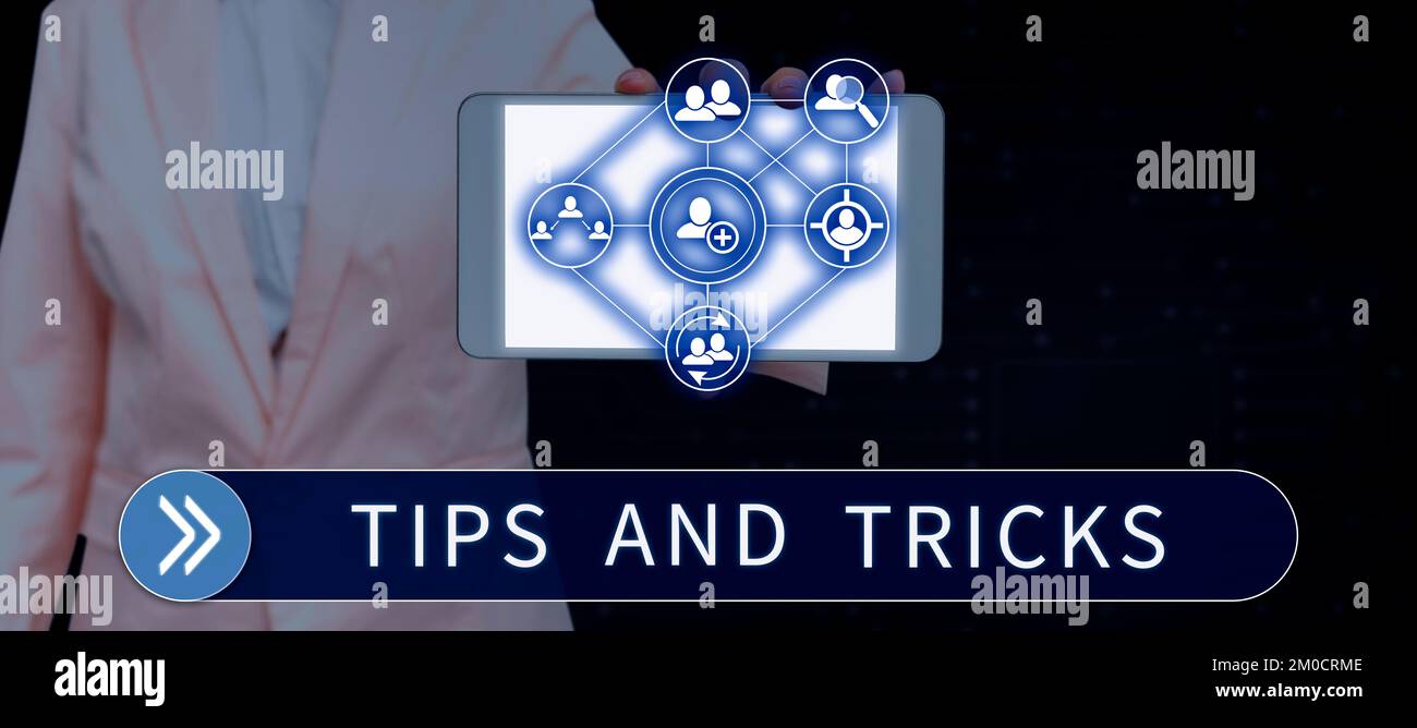 Hand writing sign Tips And Tricks. Word for helpful advices that makes ...