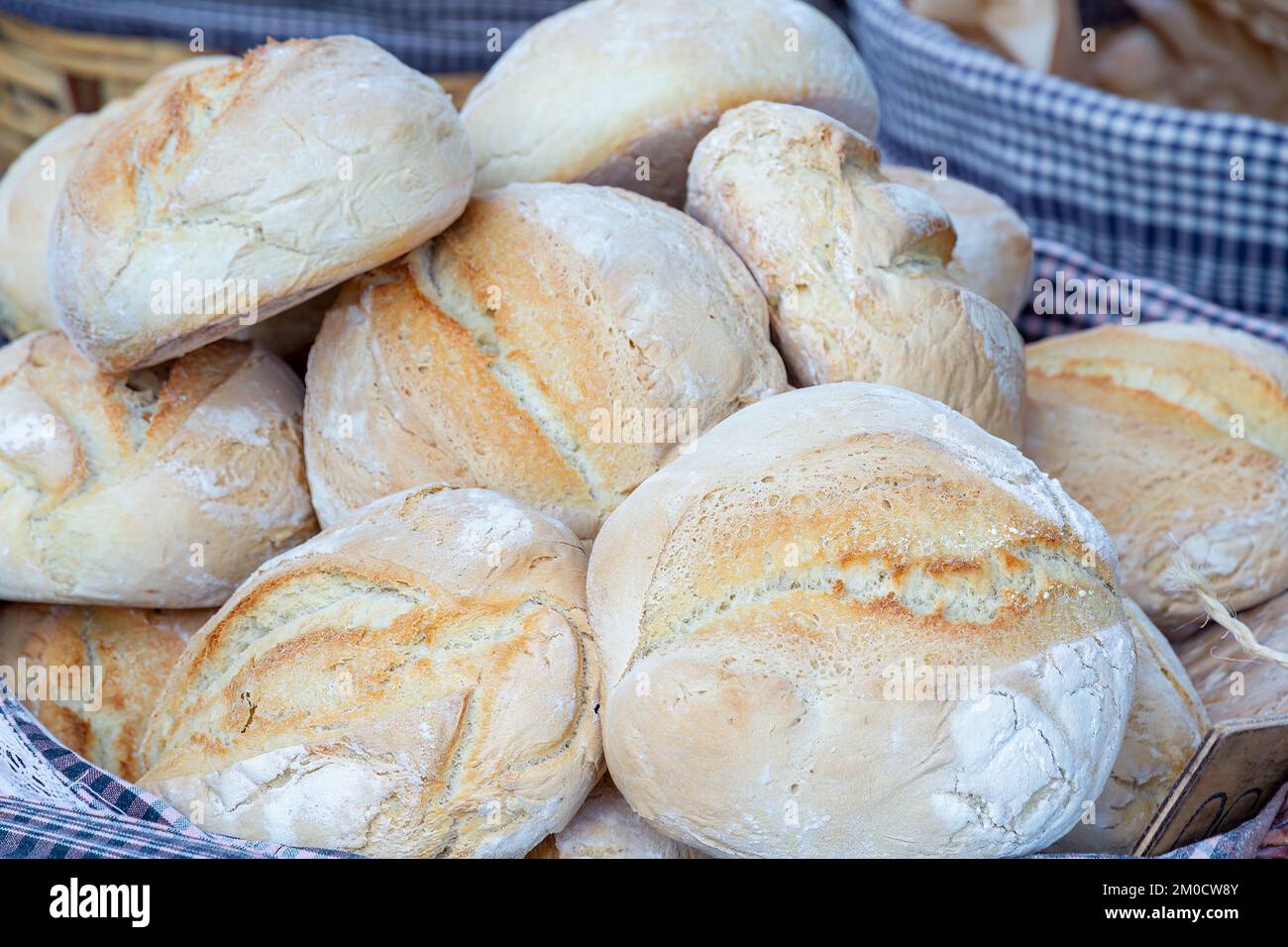 horizontal view of freshly baked loaves of bread made in an artisan way ...