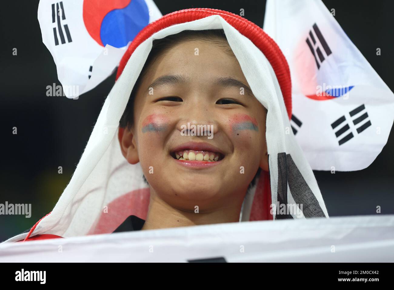 Doha, Qatar. 05th Dec, 2022. A South Korea fan looks on during the 2022 ...