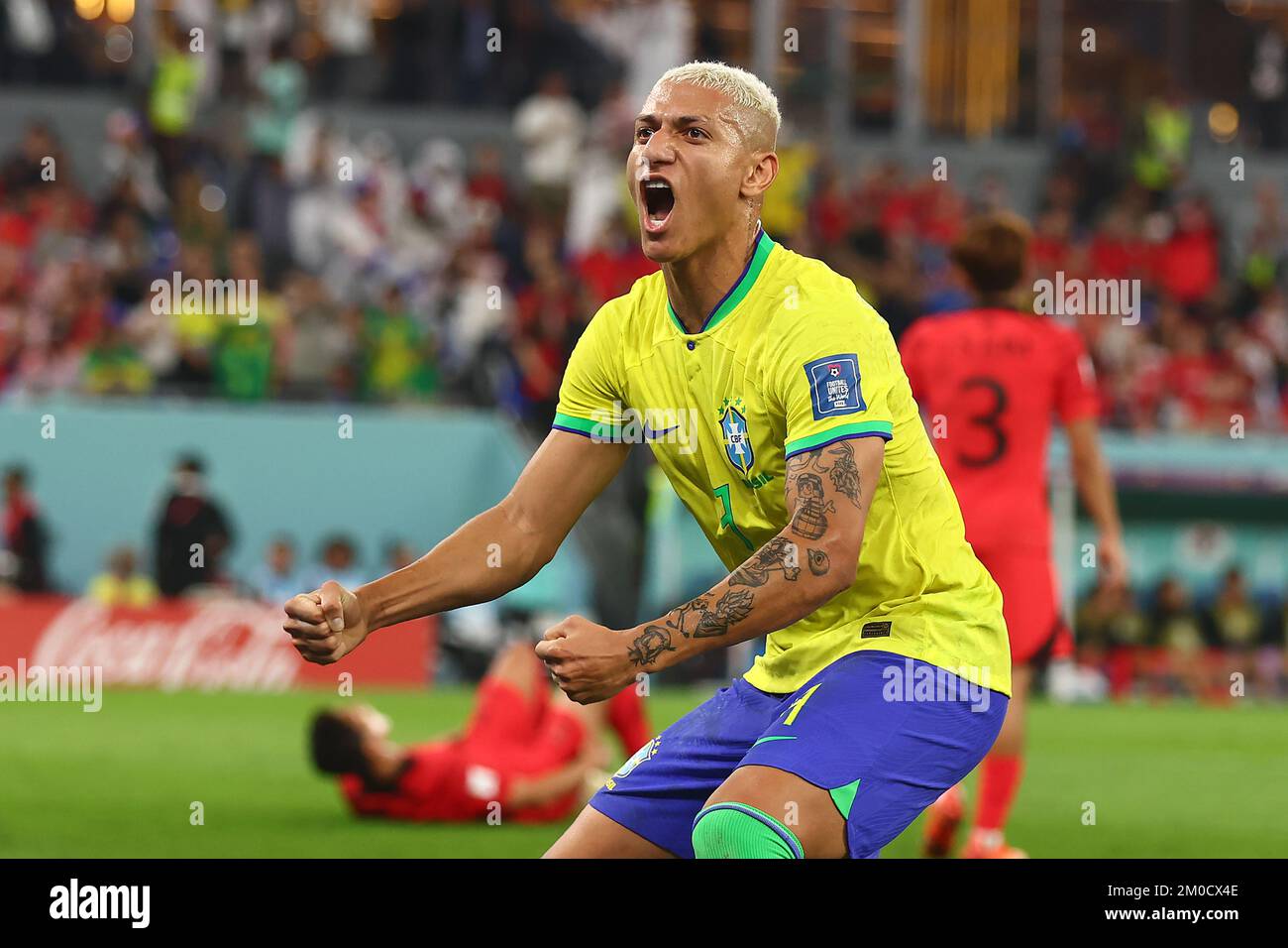 Doha, Qatar. 05th Dec, 2022. Richarlison of Brazil celebrates his side ...